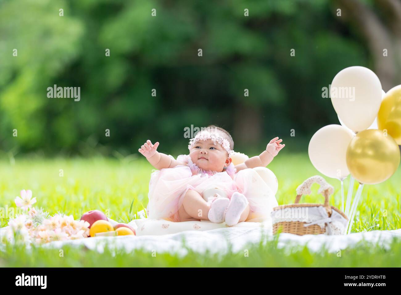 A Taiwanese couple in their 20s and their 7-month-old baby celebrate ...