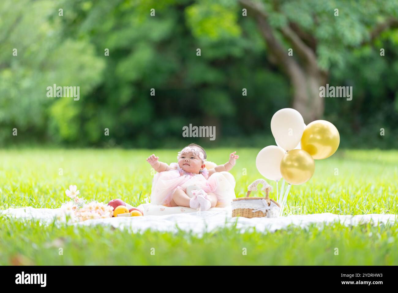 A Taiwanese couple in their 20s and their 7-month-old baby celebrate ...