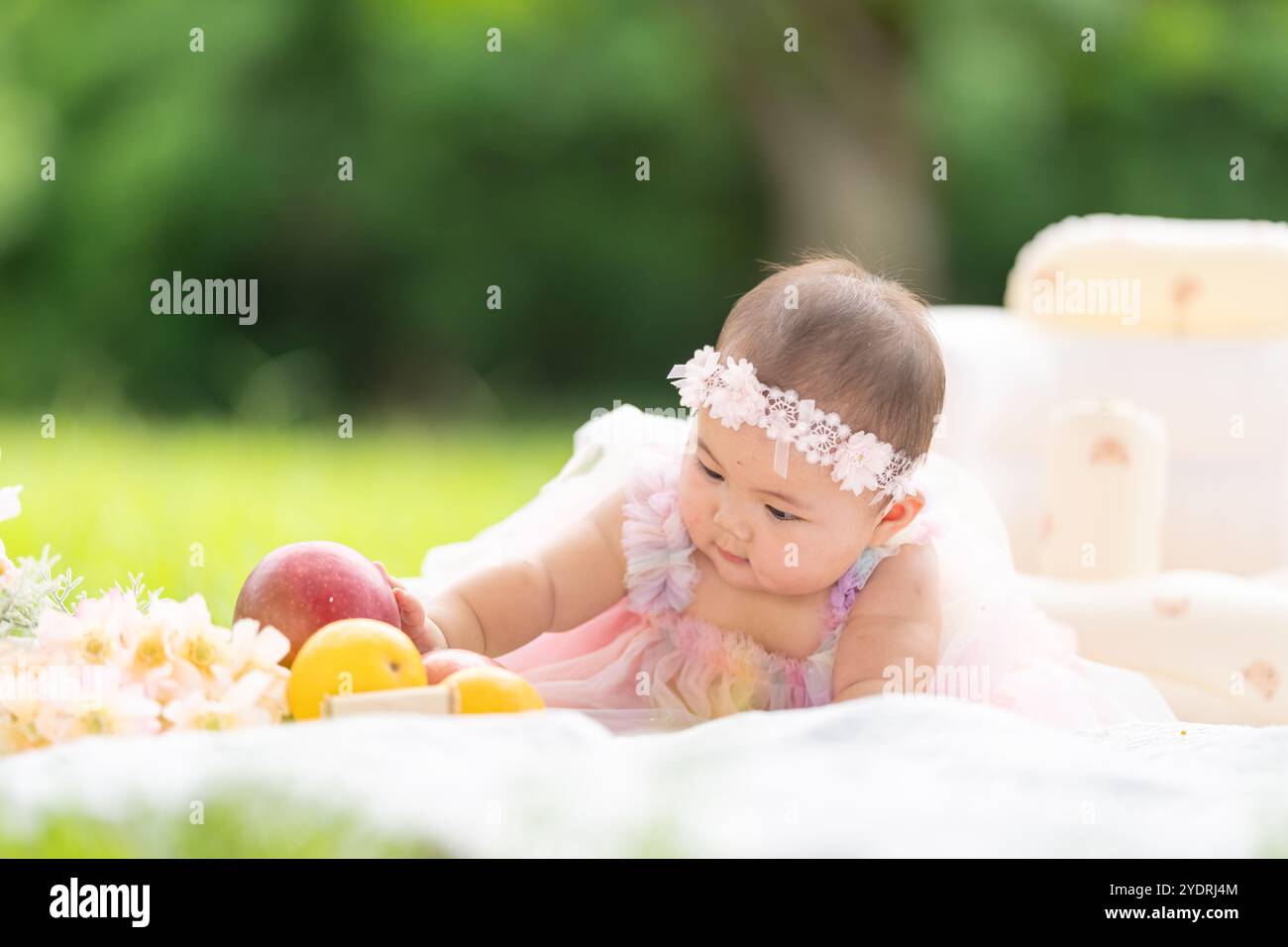 A Taiwanese couple in their 20s and their 7-month-old baby celebrate ...