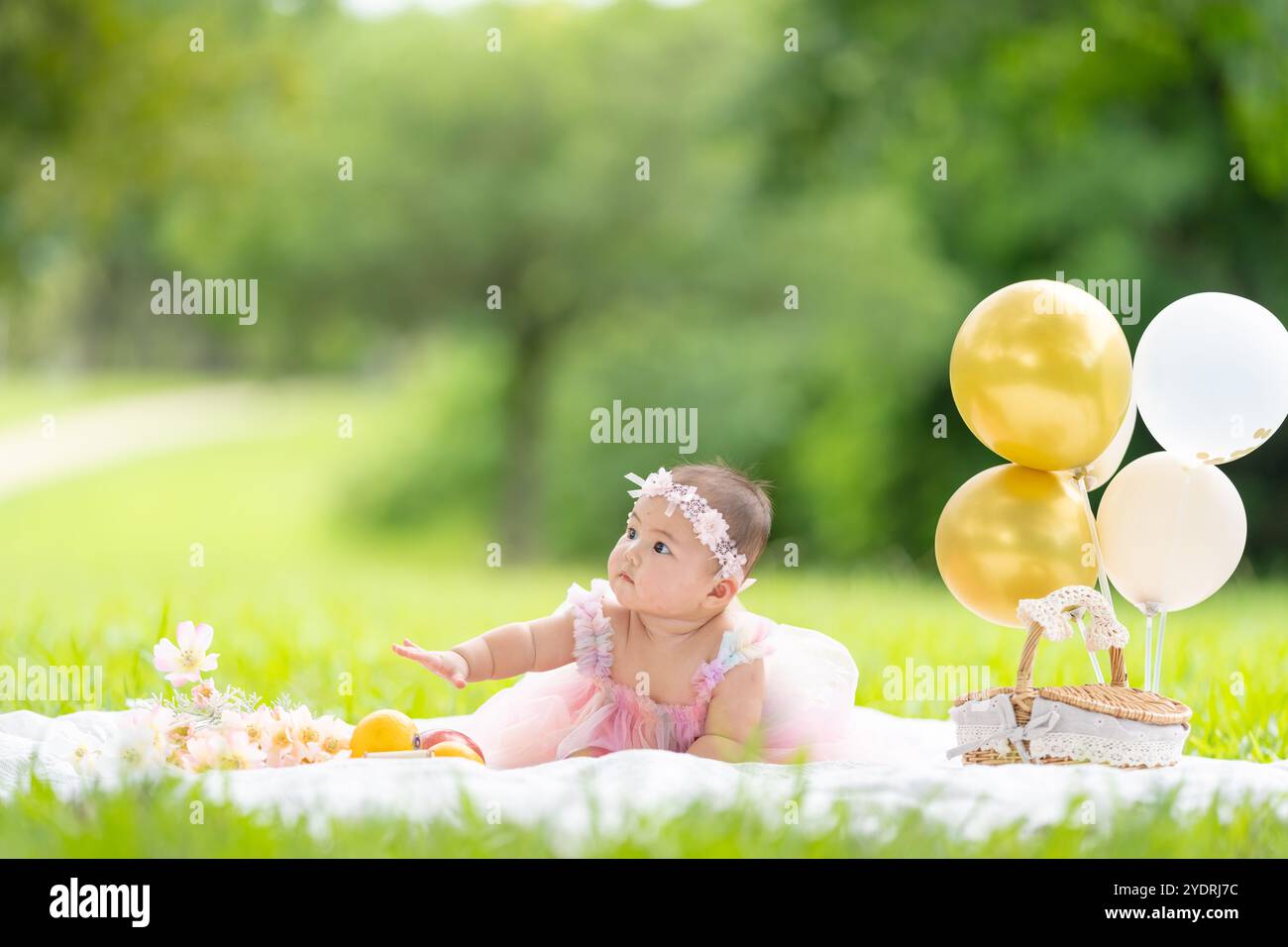 A Taiwanese couple in their 20s and their 7-month-old baby celebrate ...