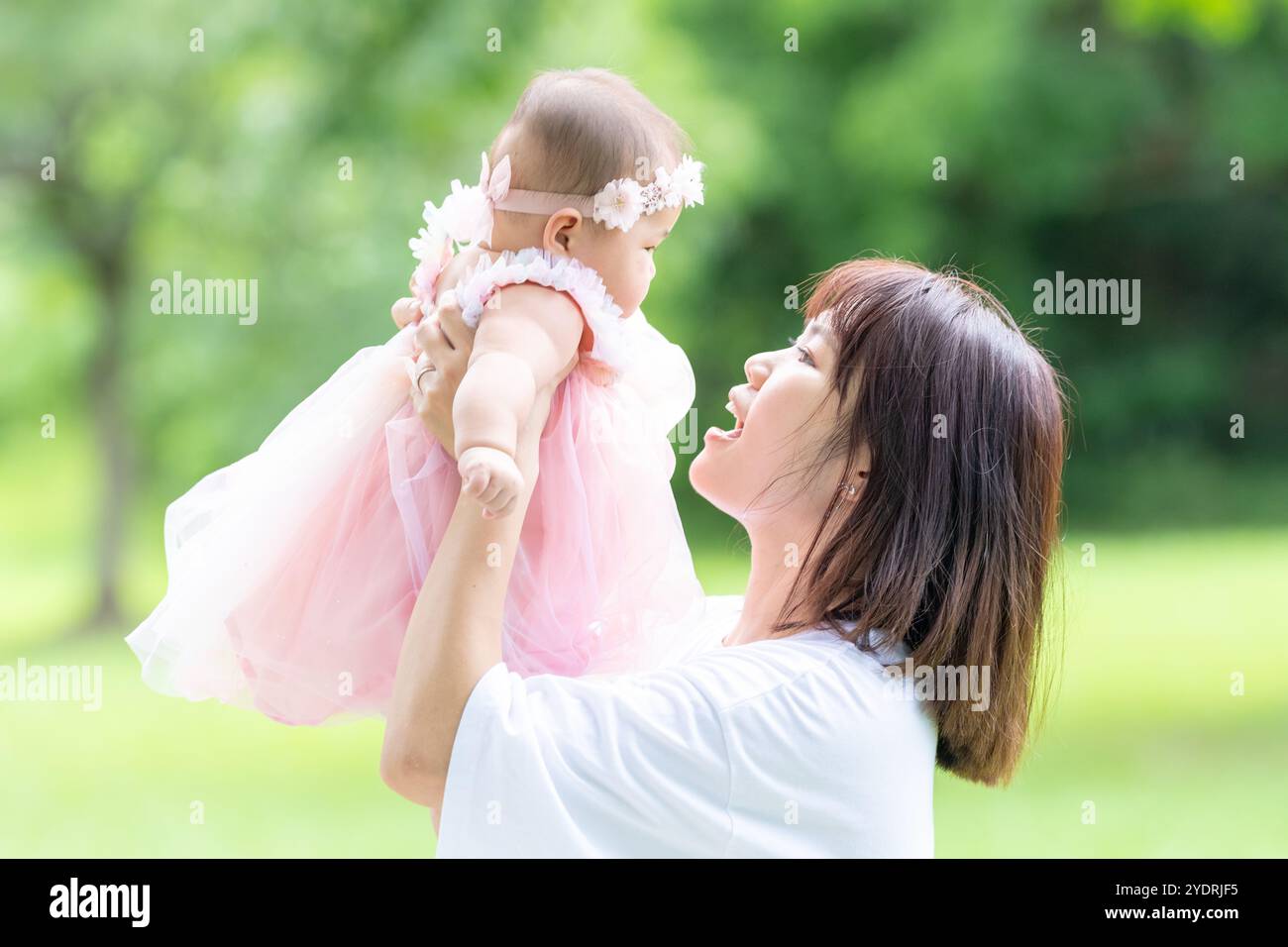 A Taiwanese couple in their 20s and their 7-month-old baby celebrate a ...
