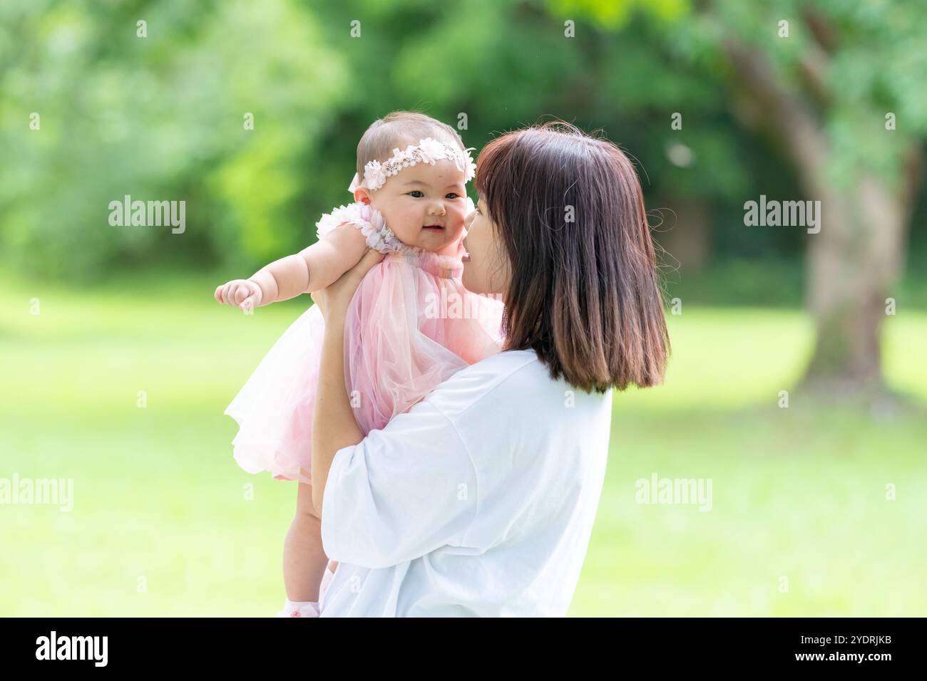 A Taiwanese couple in their 20s and their 7-month-old baby celebrate a ...