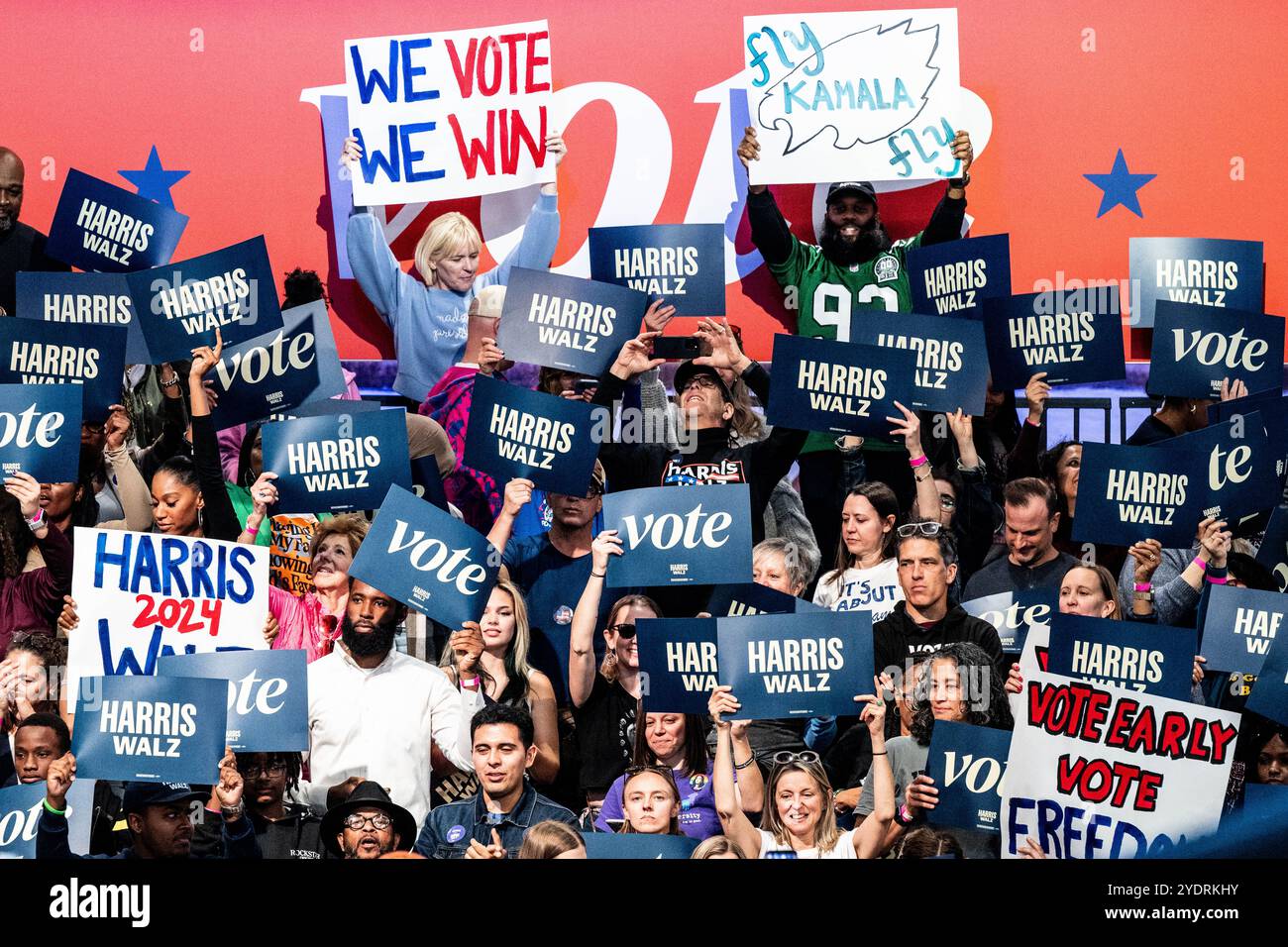 People holding up signs at a Kamala Harris campaign rally at the The ...