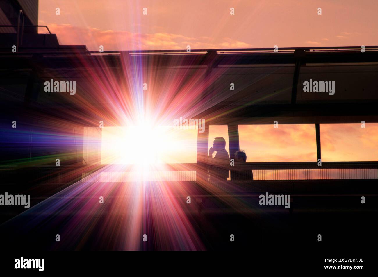 Pedestrian bridge at dusk Stock Photo - Alamy