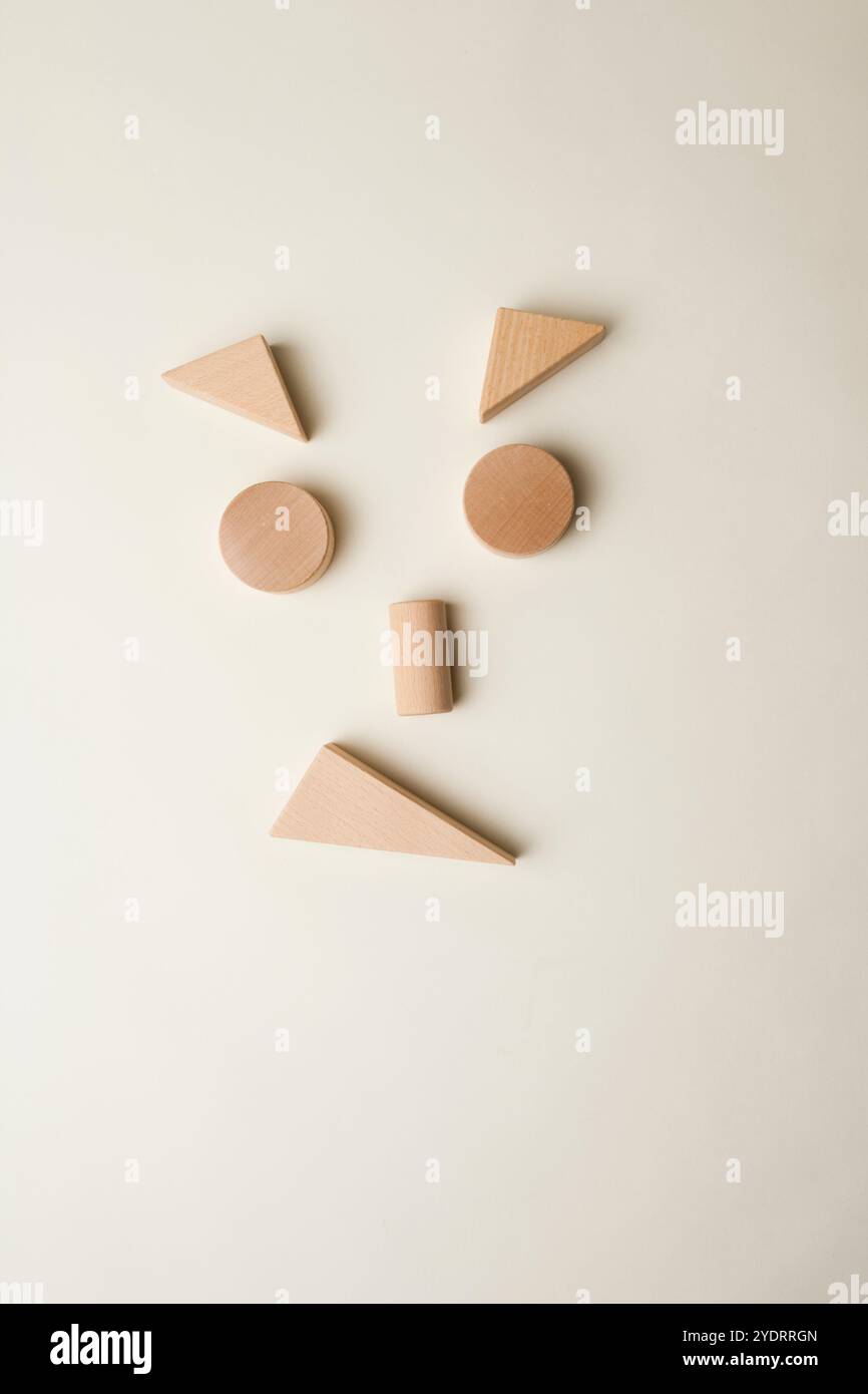 Faces made of wood blocks Stock Photo - Alamy