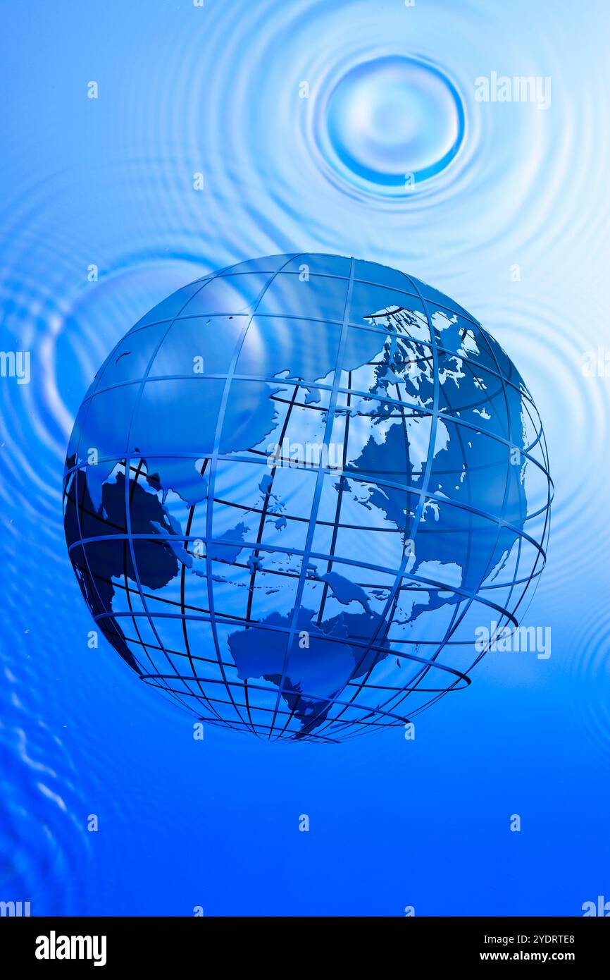 Globe and water surface Stock Photo - Alamy