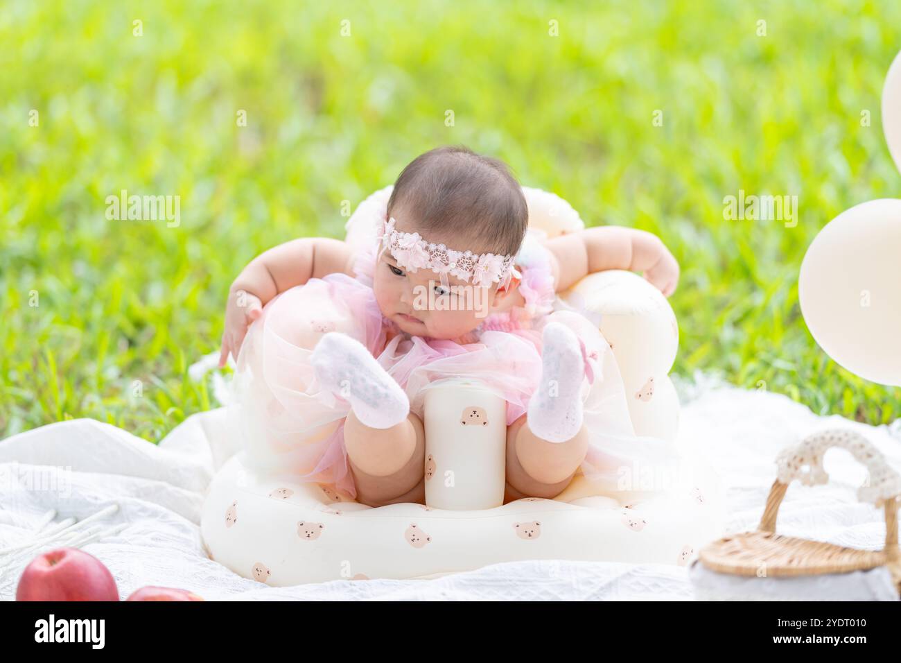 A Taiwanese couple in their 20s and their 7-month-old baby celebrate ...