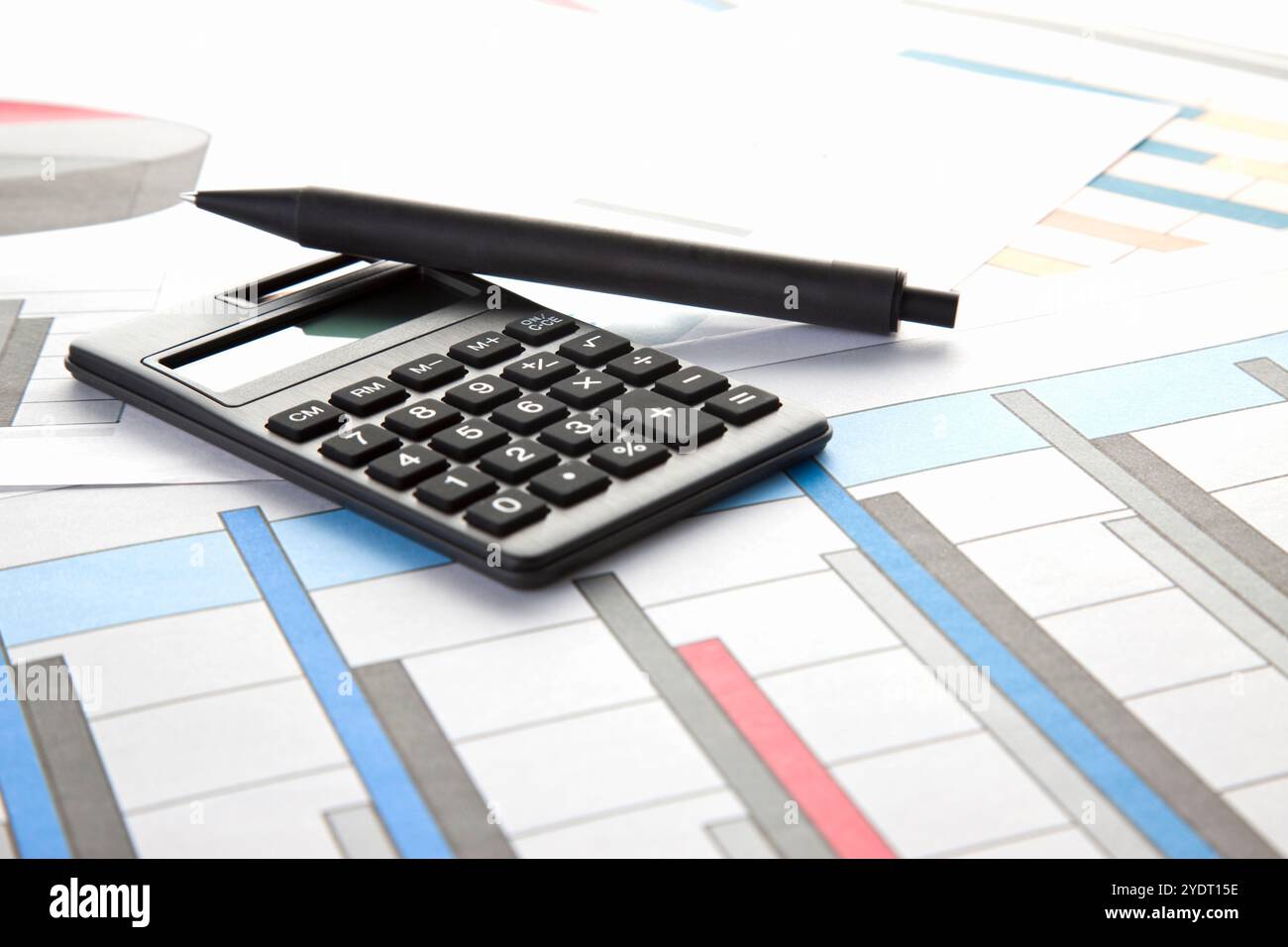 Calculator and graph Stock Photo - Alamy