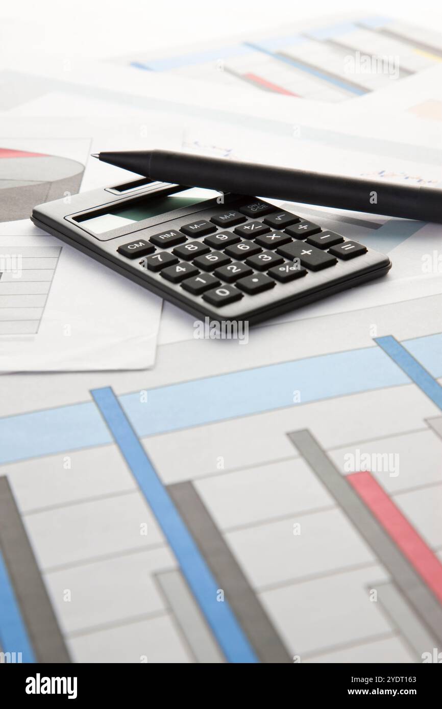 Calculator and graph Stock Photo - Alamy
