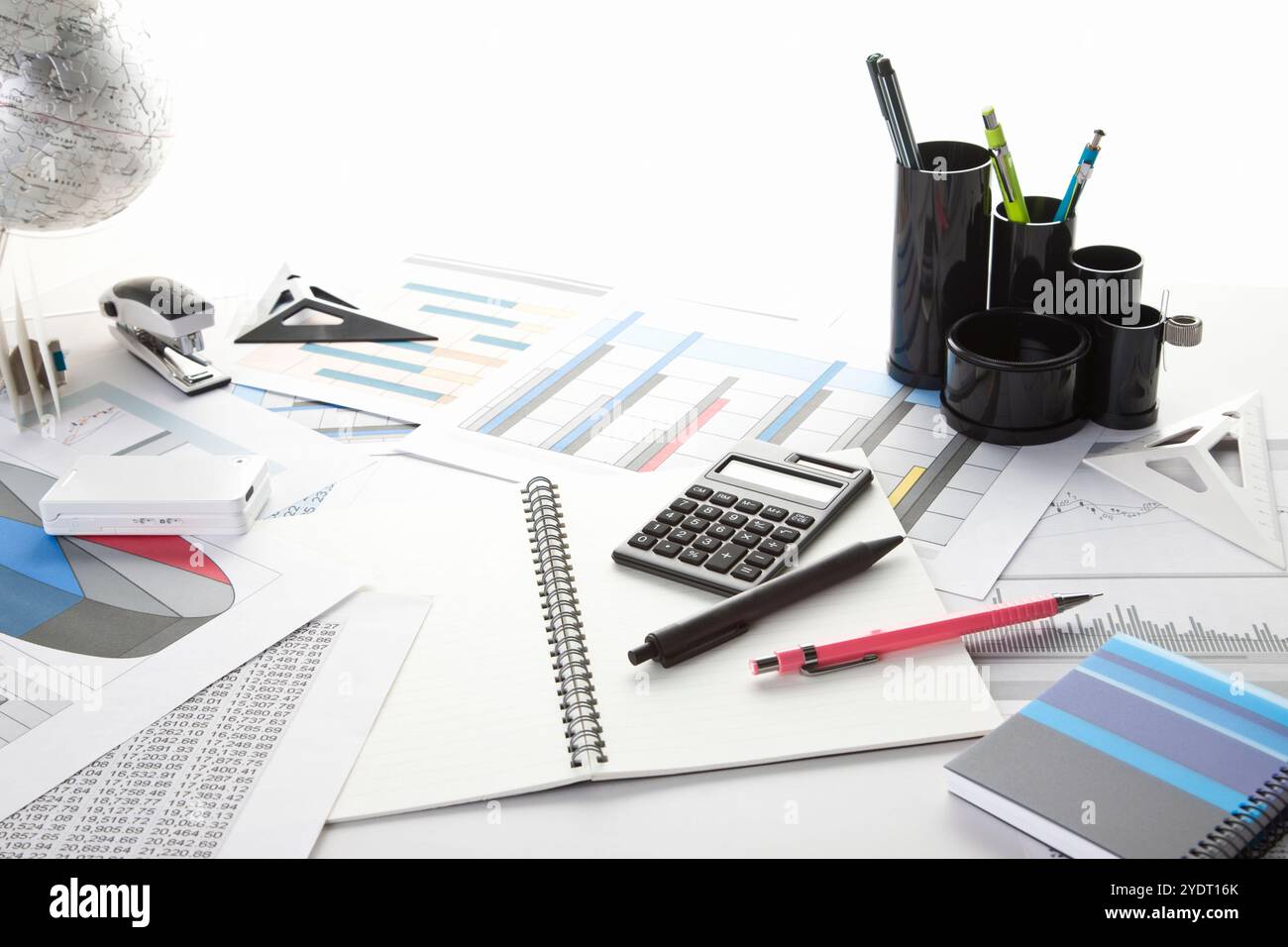 Calculator and graph Stock Photo - Alamy