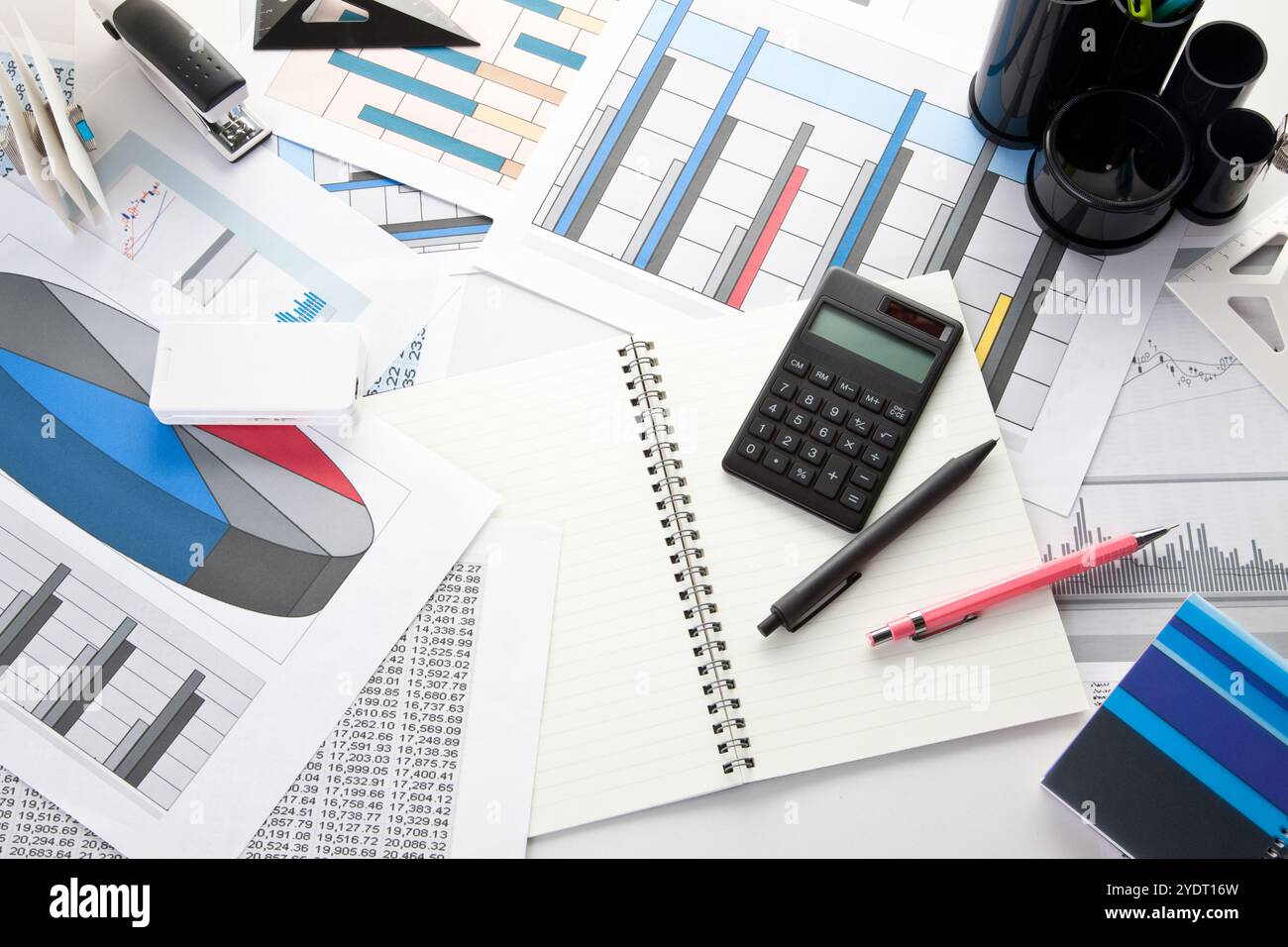 Calculator and graph Stock Photo - Alamy