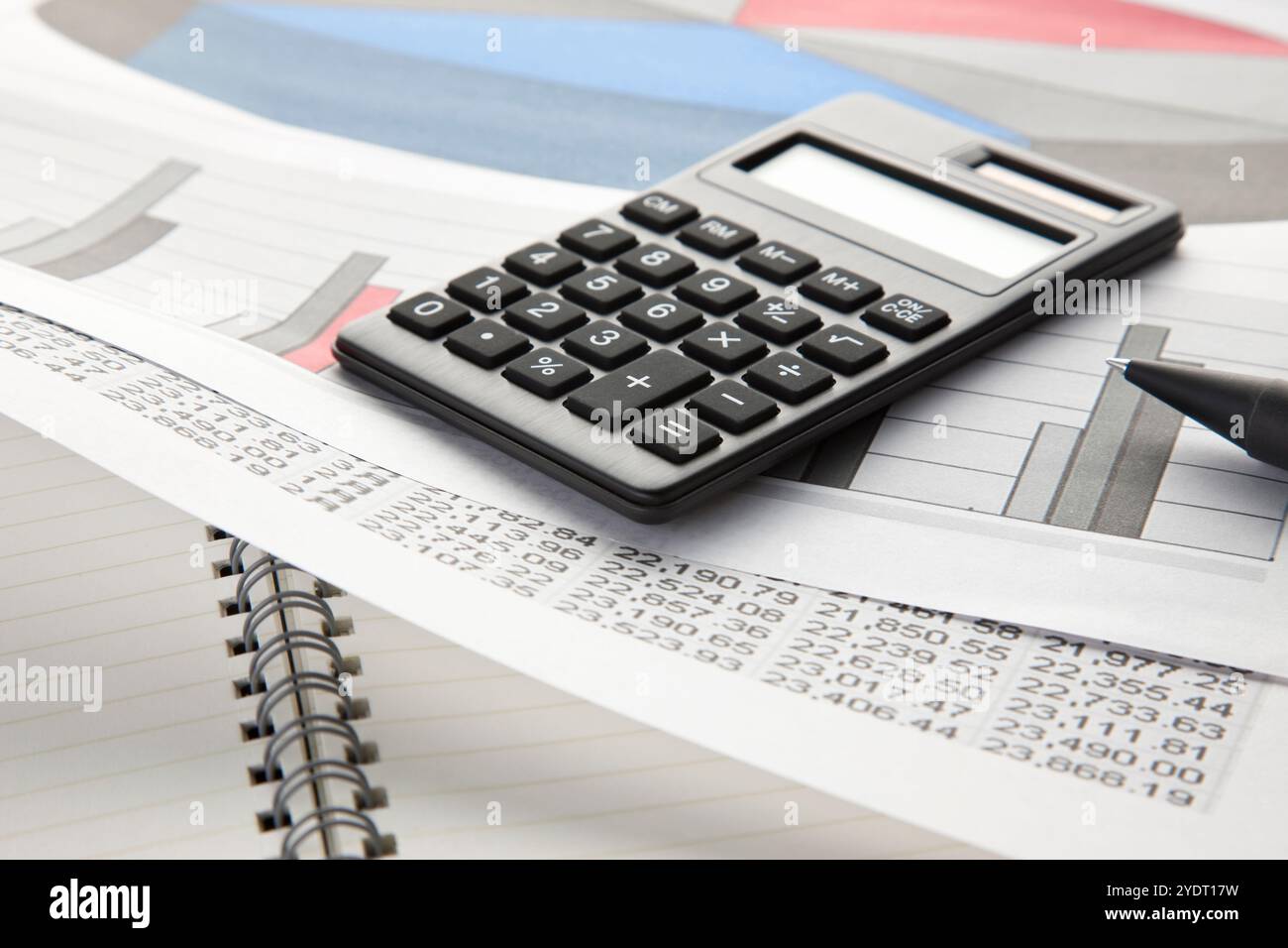 Calculator and graph Stock Photo - Alamy