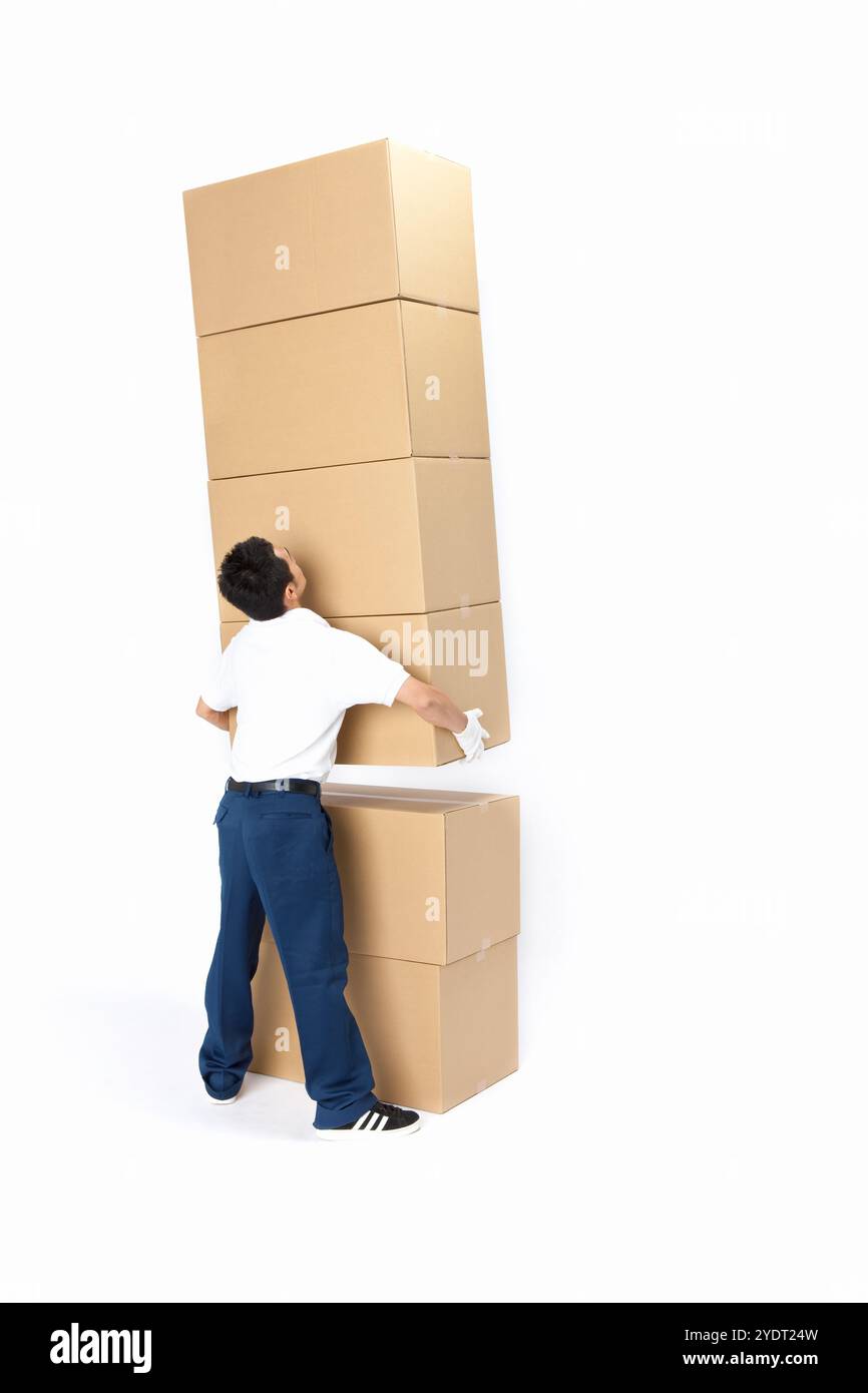 Delivery worker lifting box hi-res stock photography and images - Alamy