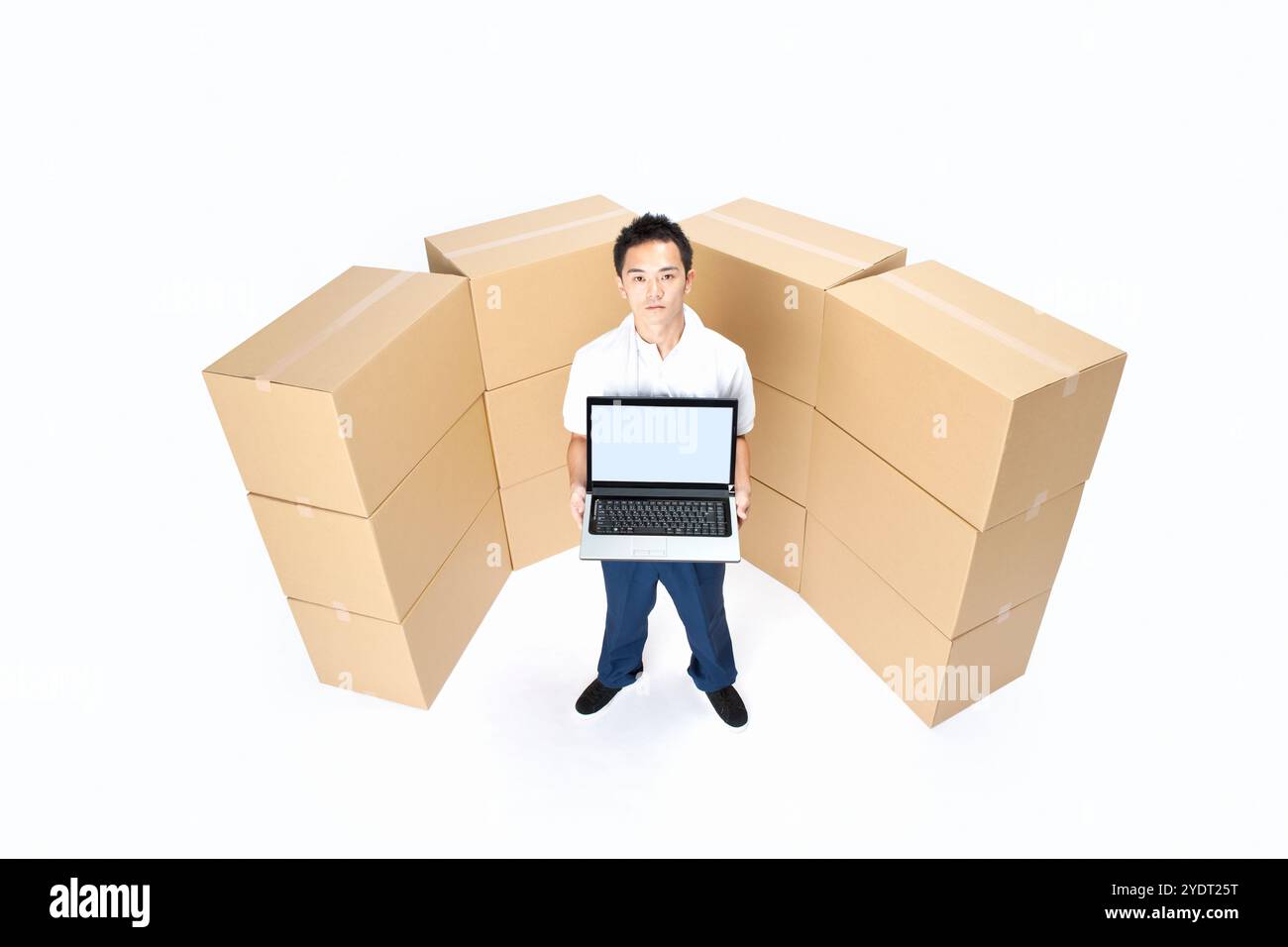 Transport worker holding laptop Stock Photo - Alamy