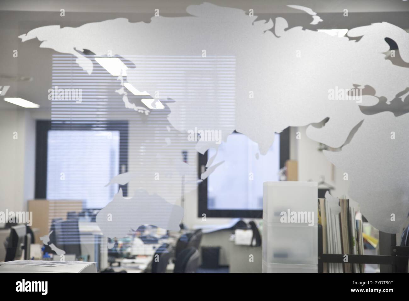 Glass with world map Stock Photo - Alamy