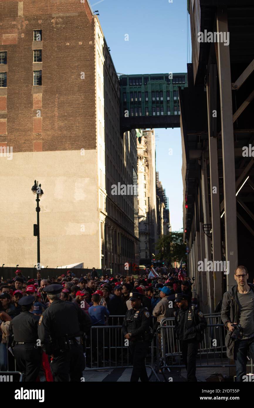 New York, NY. October 27th, 2024. Trump supporters line up for entry ...