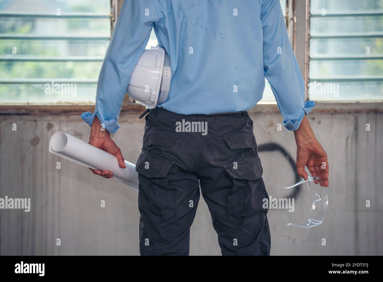 Engineer arm hands holding hardhat white work helmet hard hat for Civil ...