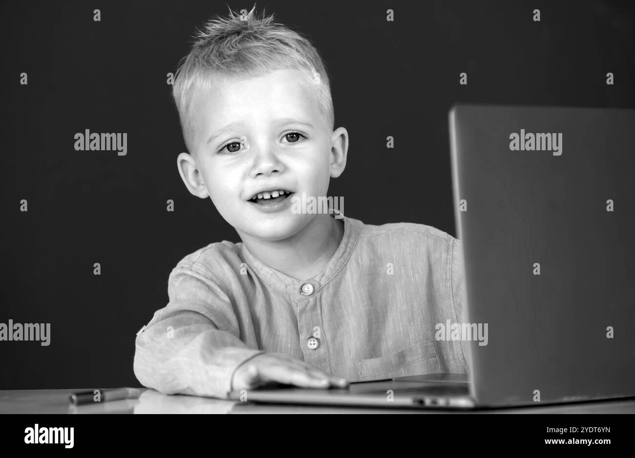 Smart boy student learning online in class. Klever kid study online ...