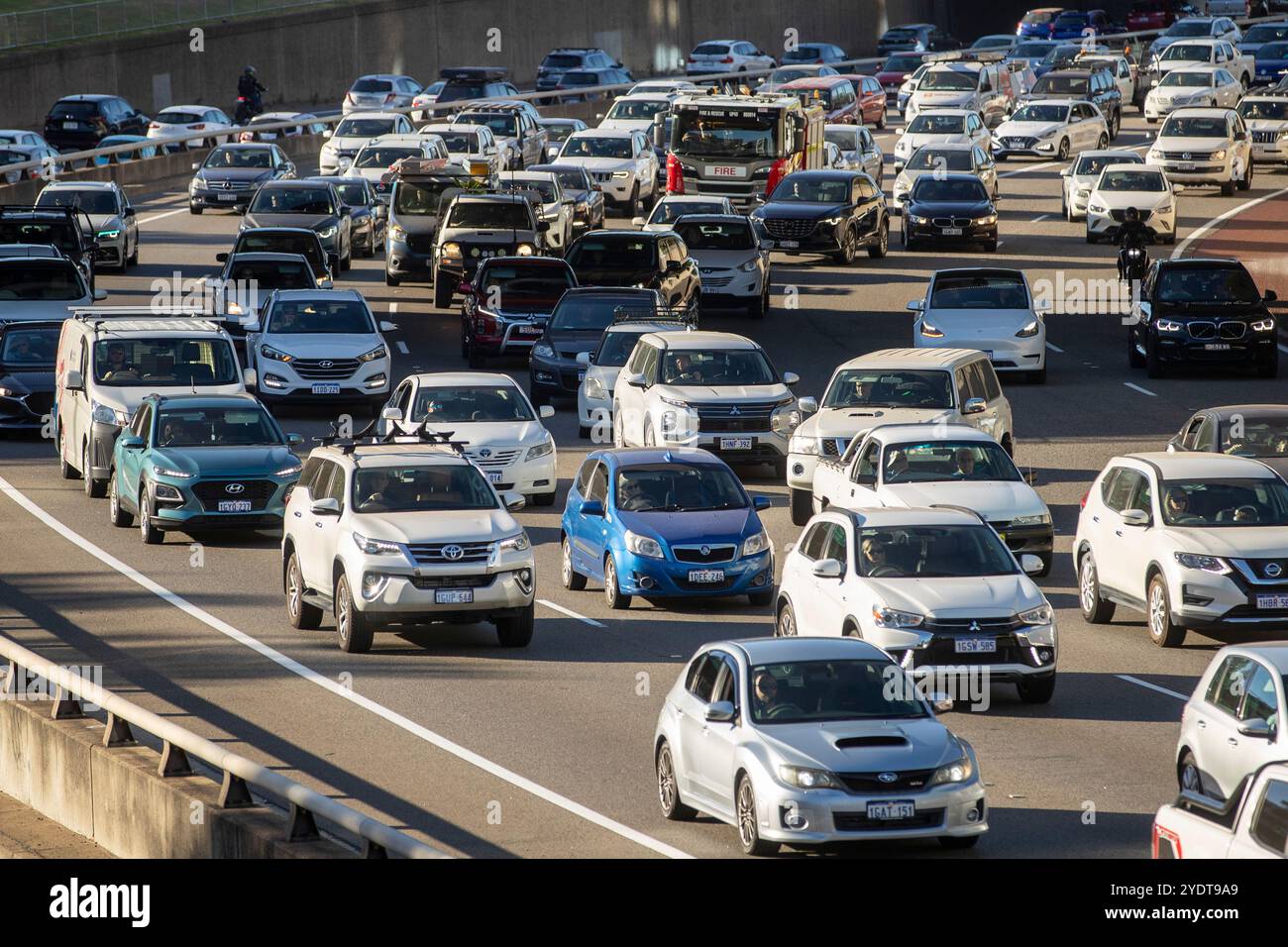 Heavy afternoon traffic on a freeway in Perth, Australia, showing a ...