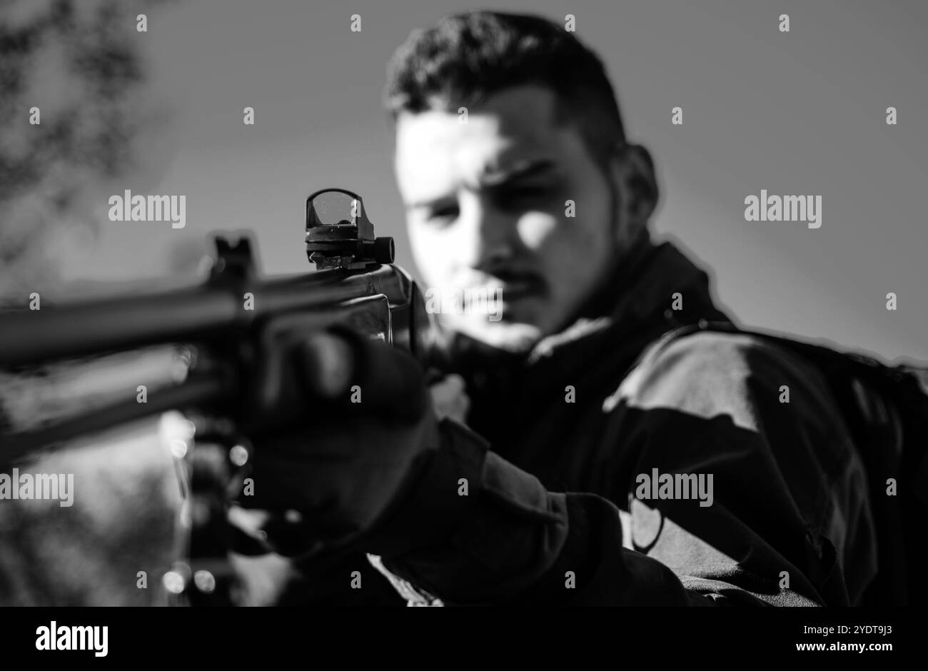 Hunter aiming rifle in forest. Hunter man. Hunting period, season. Male ...