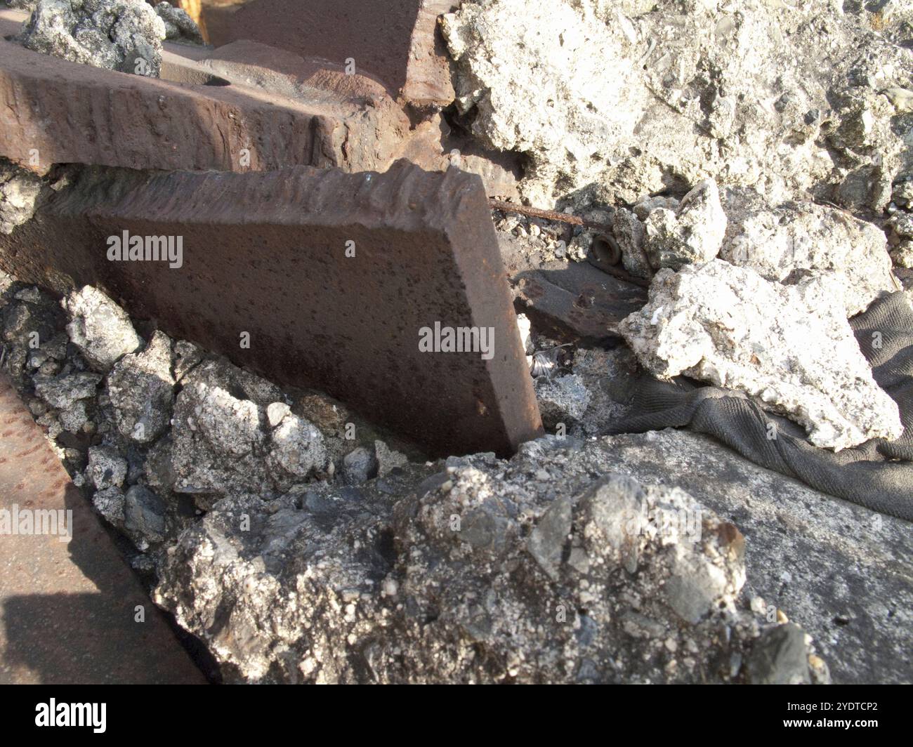 Iron lumps and concrete Stock Photo - Alamy