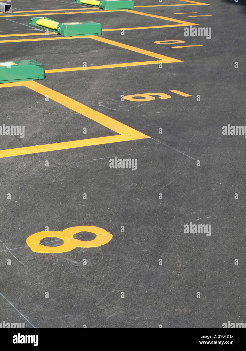 Coin-operated parking stopper Stock Photo - Alamy