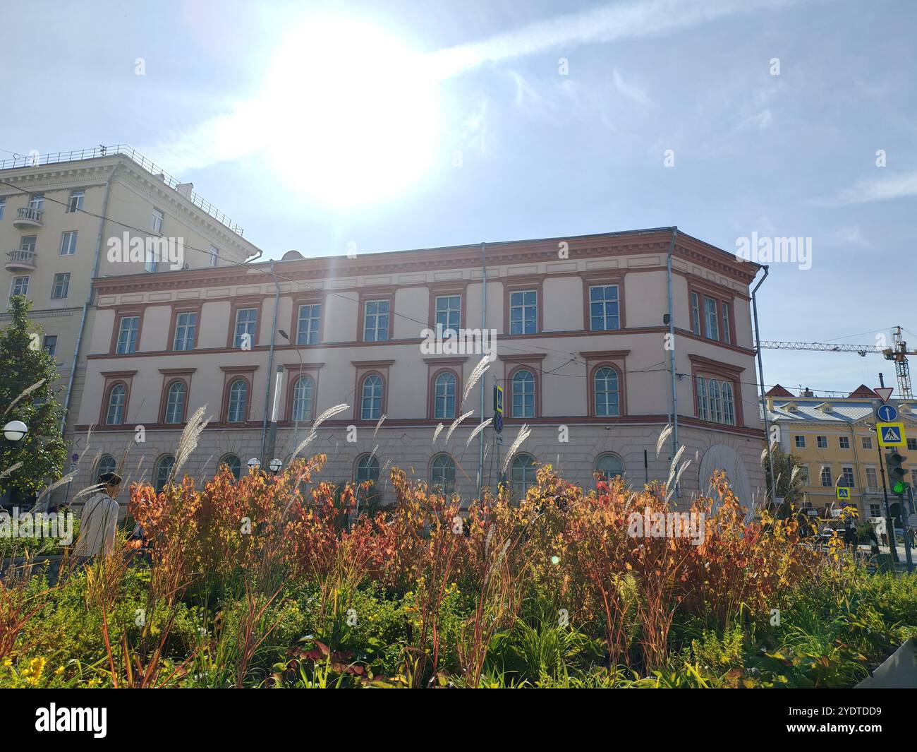 large two-story classical building with ornate detailing, large windows ...
