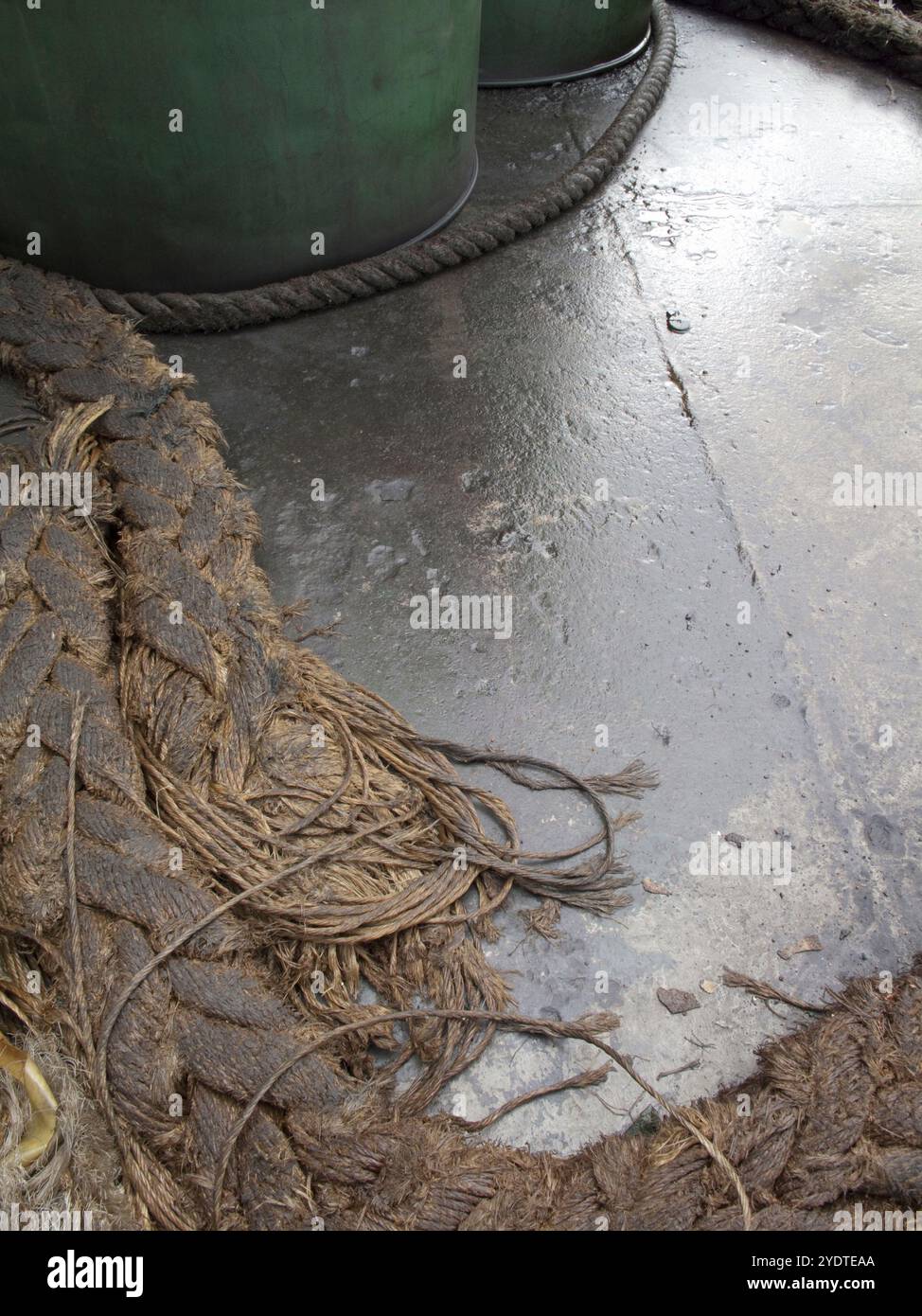 Oil-stained floor and rope Stock Photo - Alamy