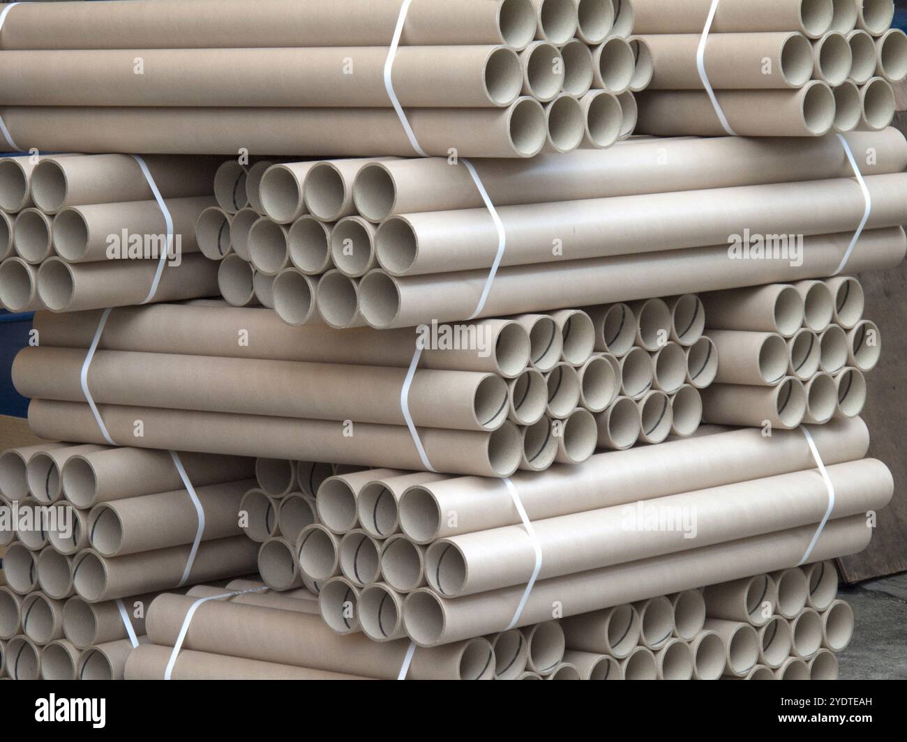 Stacks of cardboard cores Stock Photo - Alamy