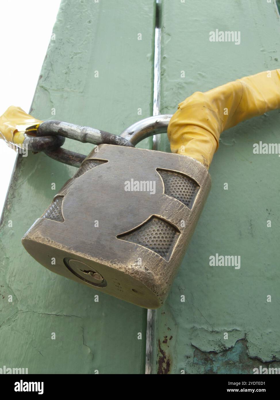 Heavy-duty locks on iron doors Stock Photo - Alamy