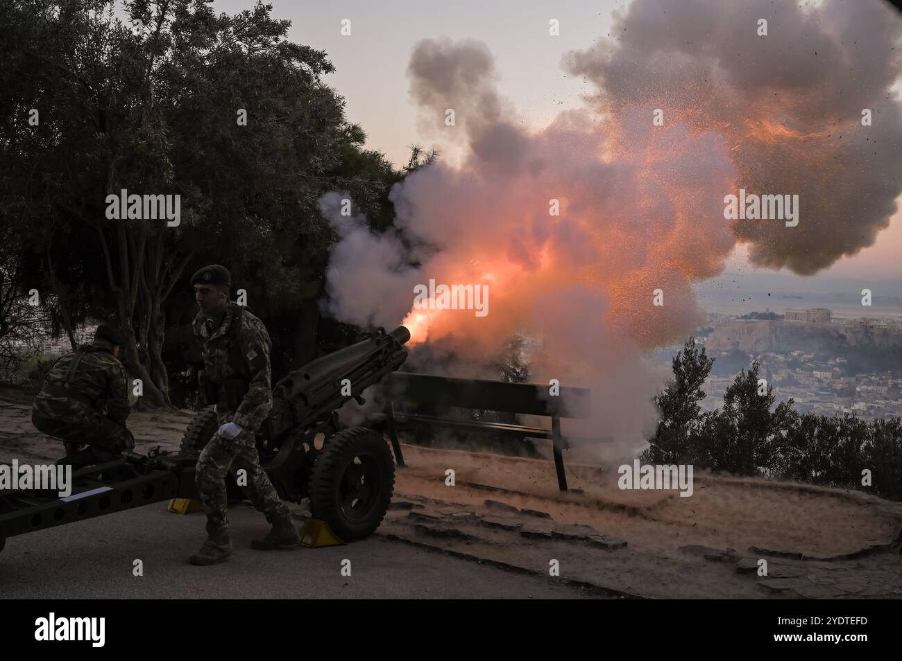 Athens, Greece. 28 October 2024. Greek soldiers fire a cannon over the ...