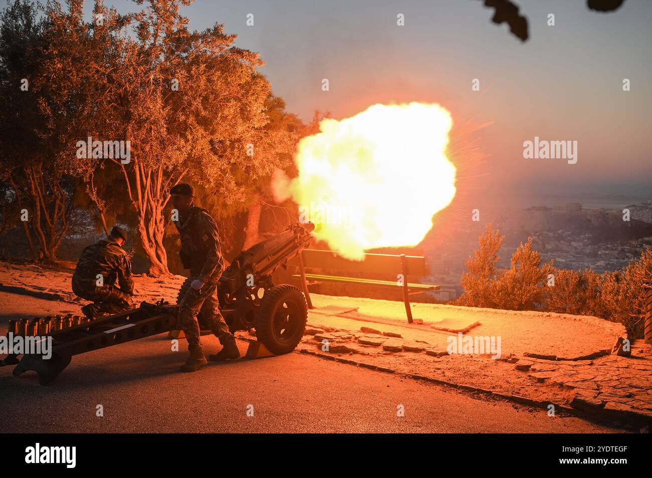 Athens, Greece. 28 October 2024. Greek soldiers fire a cannon over the ...