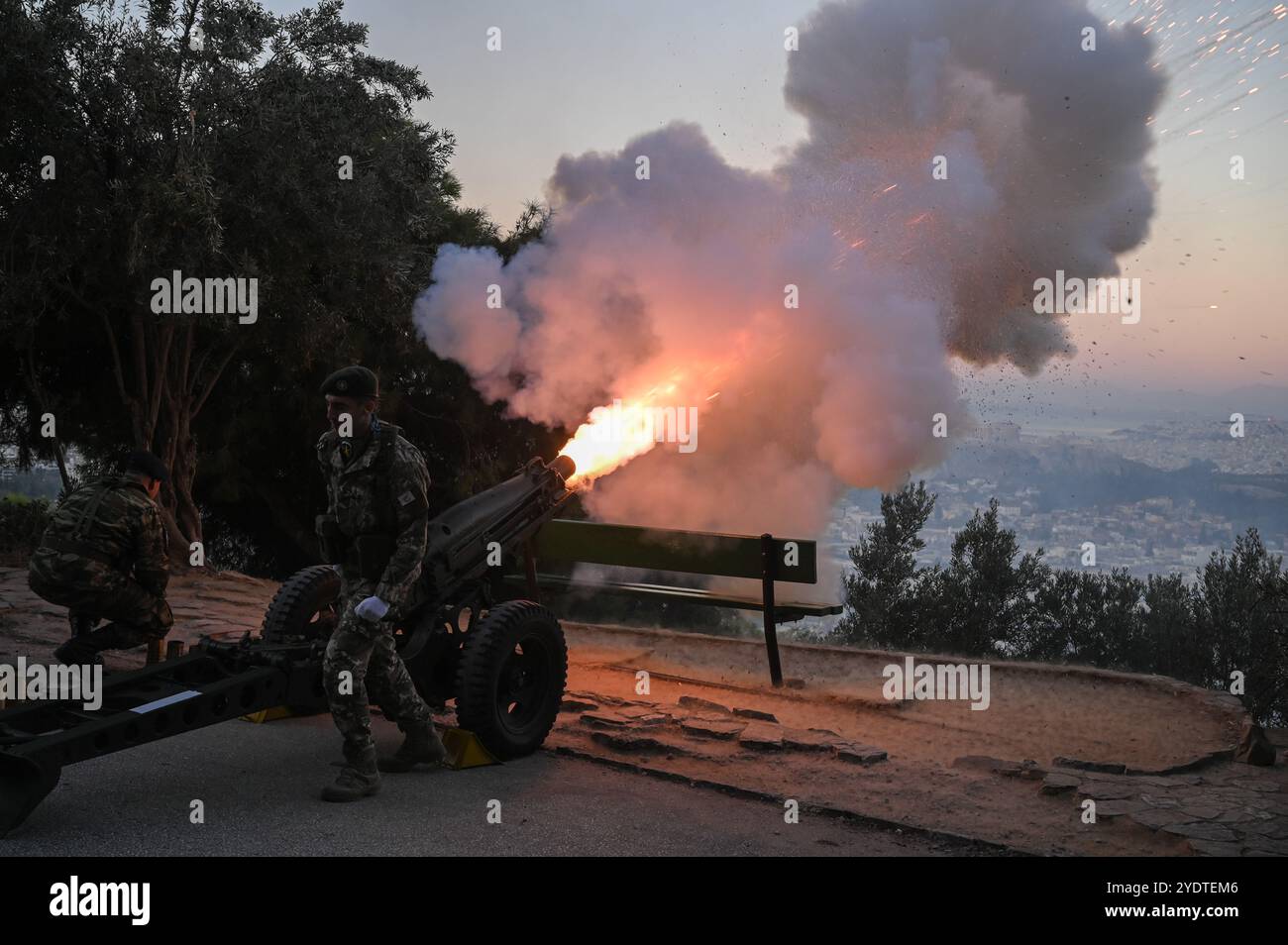 Athens, Greece. 28 October 2024. Greek soldiers fire a cannon over the ...