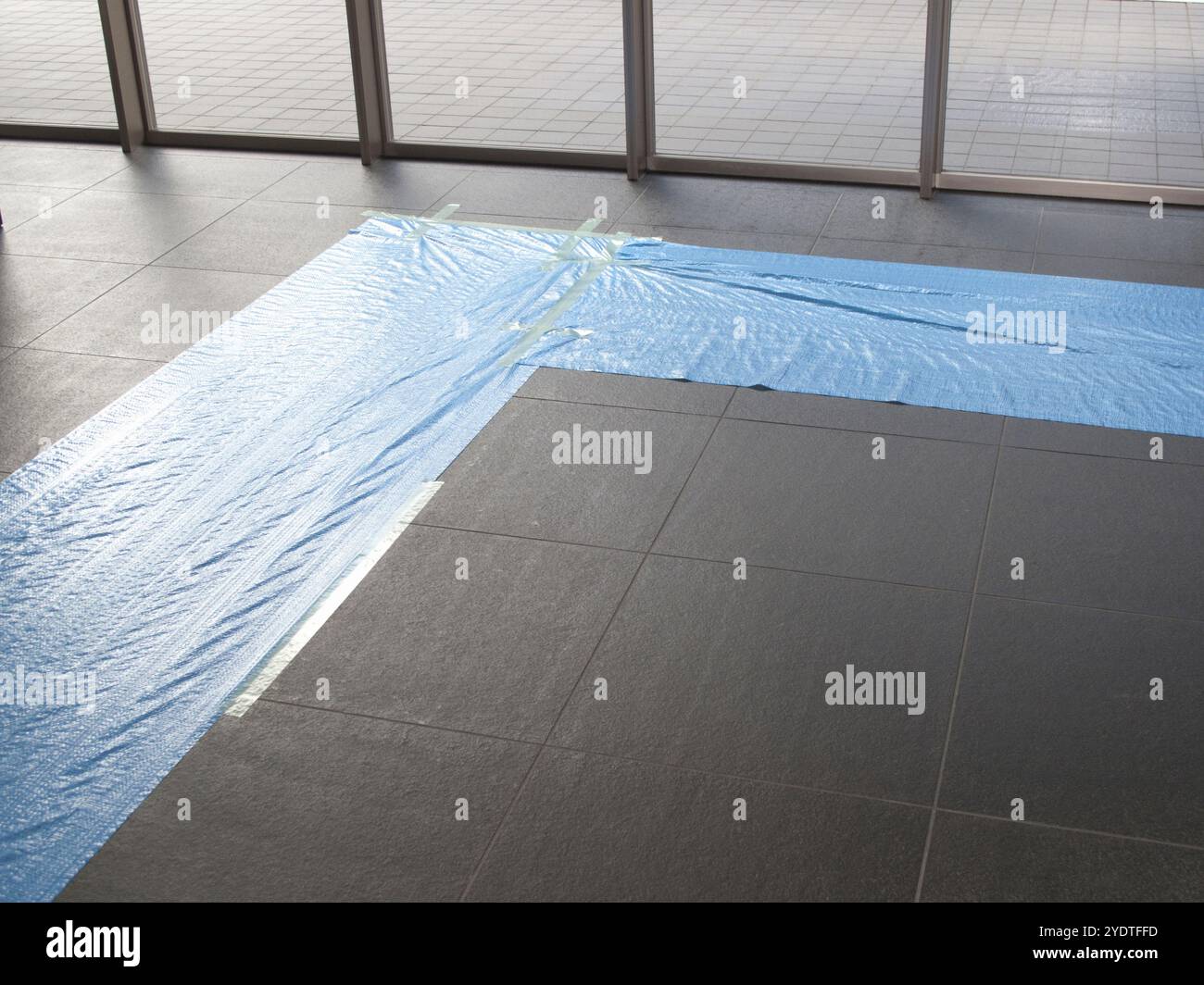 Floor protection sheets during the move Stock Photo - Alamy