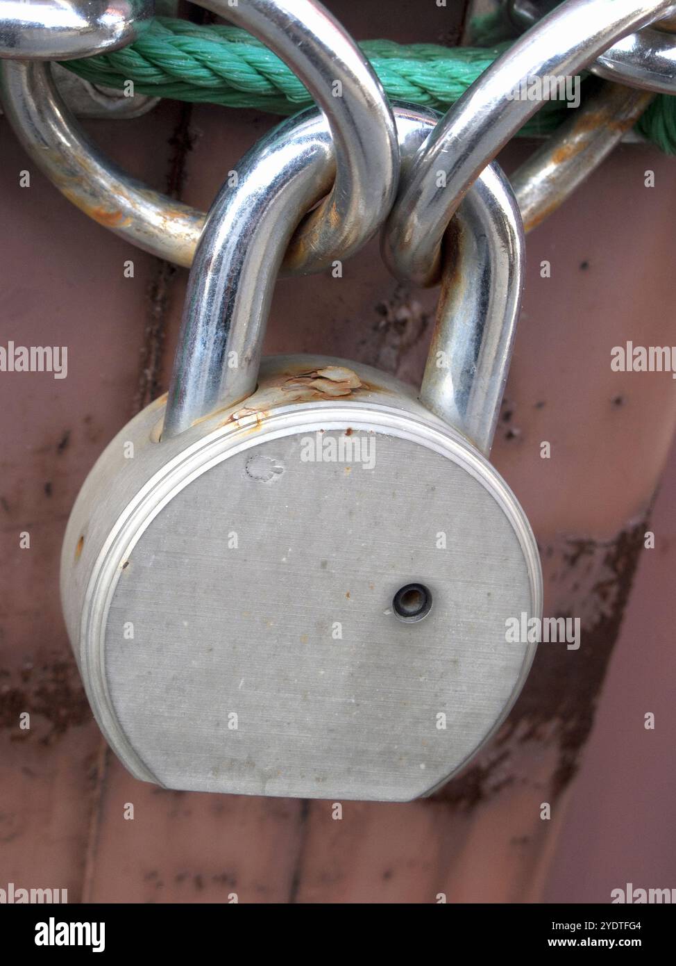 Heavy-duty locks on iron doors Stock Photo - Alamy