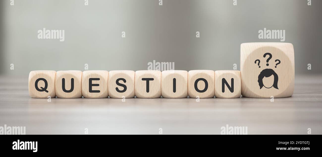 Wooden blocks with symbol of question concept Stock Photo - Alamy