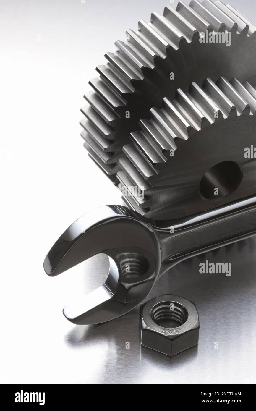 Spanner and gear Stock Photo - Alamy