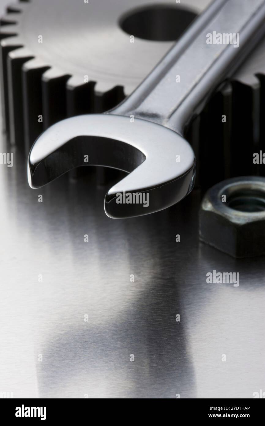 Spanner and gear Stock Photo - Alamy