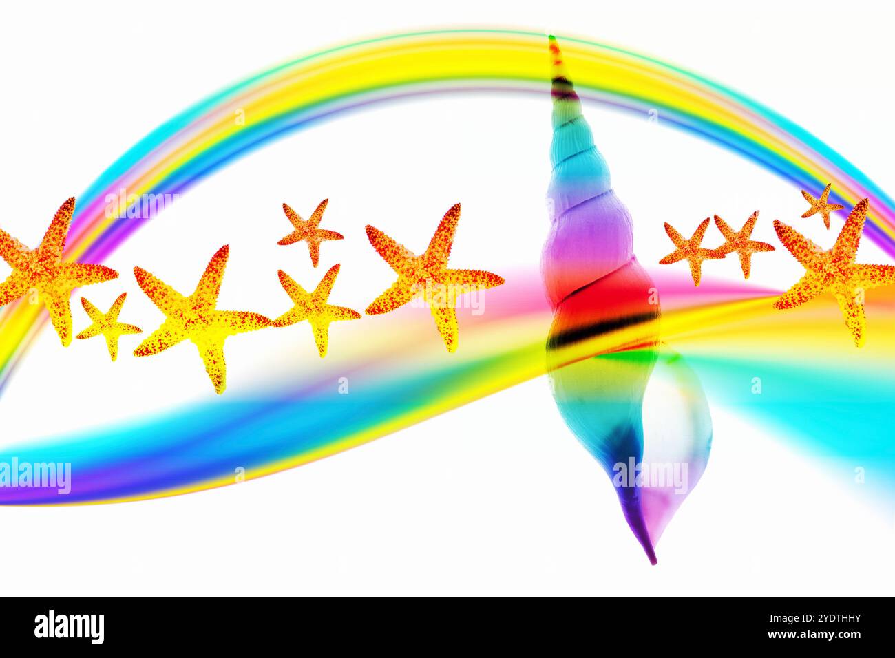 Shells on rainbow-coloured water surface Stock Photo - Alamy