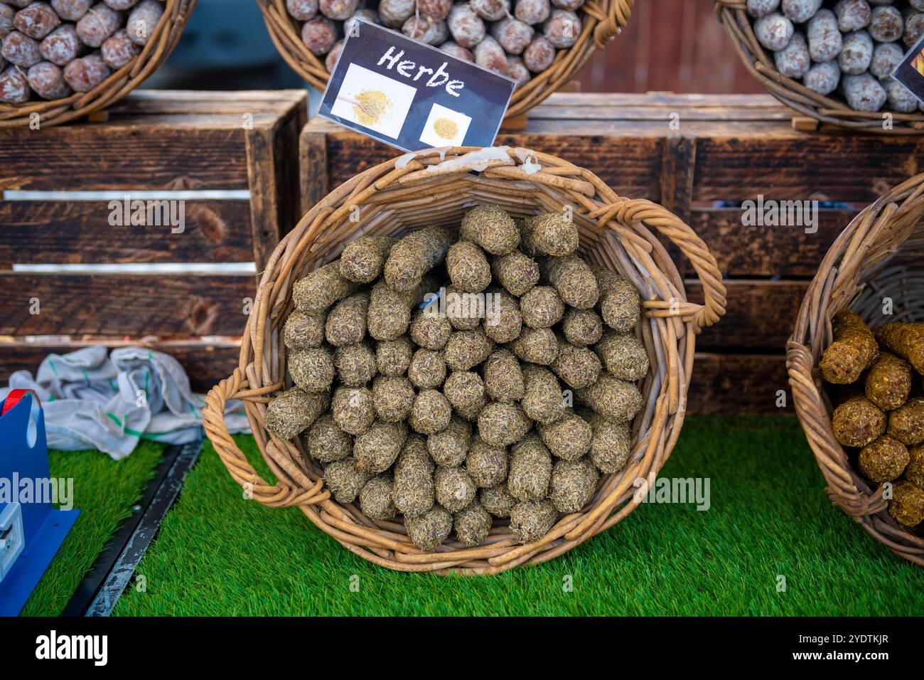 The aroma of herbs and cured meats fills the air at this bustling ...