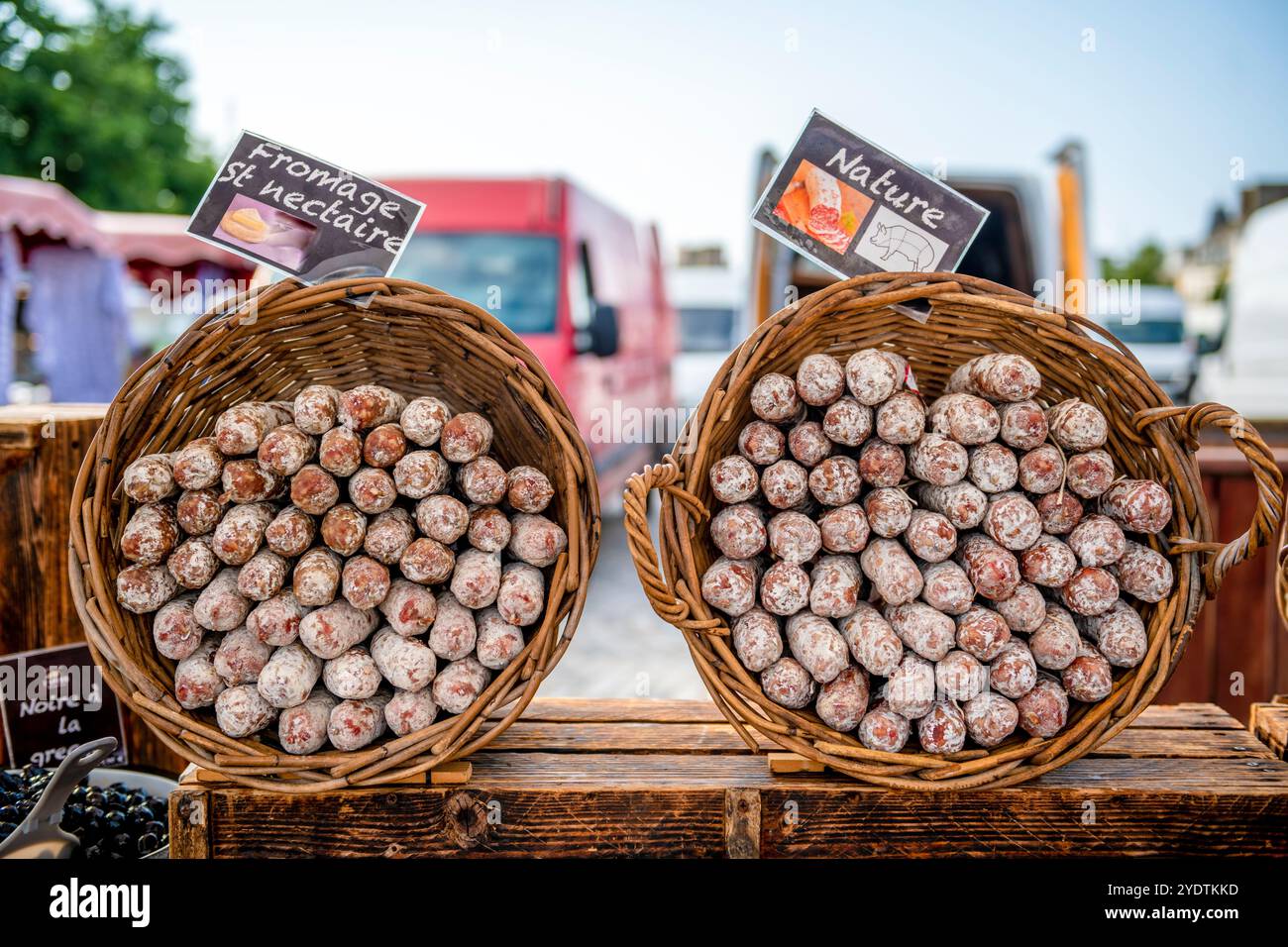 The aroma of herbs and cured meats fills the air at this bustling ...