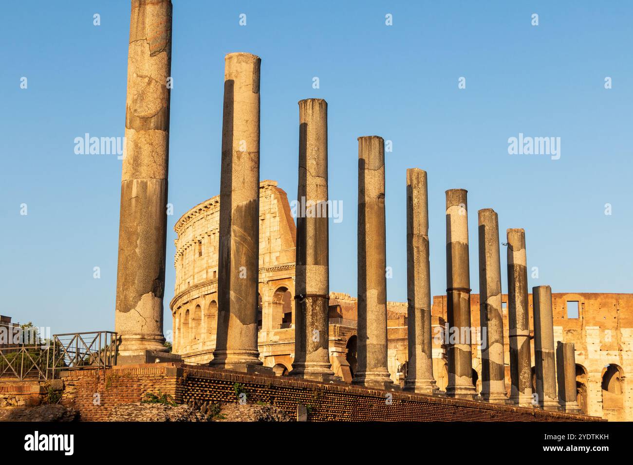 view of the colosseum and some ancient columns of the roman forum from ...
