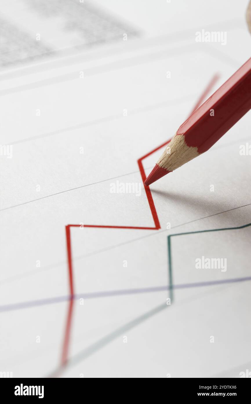 Graphs and red pencils Stock Photo - Alamy