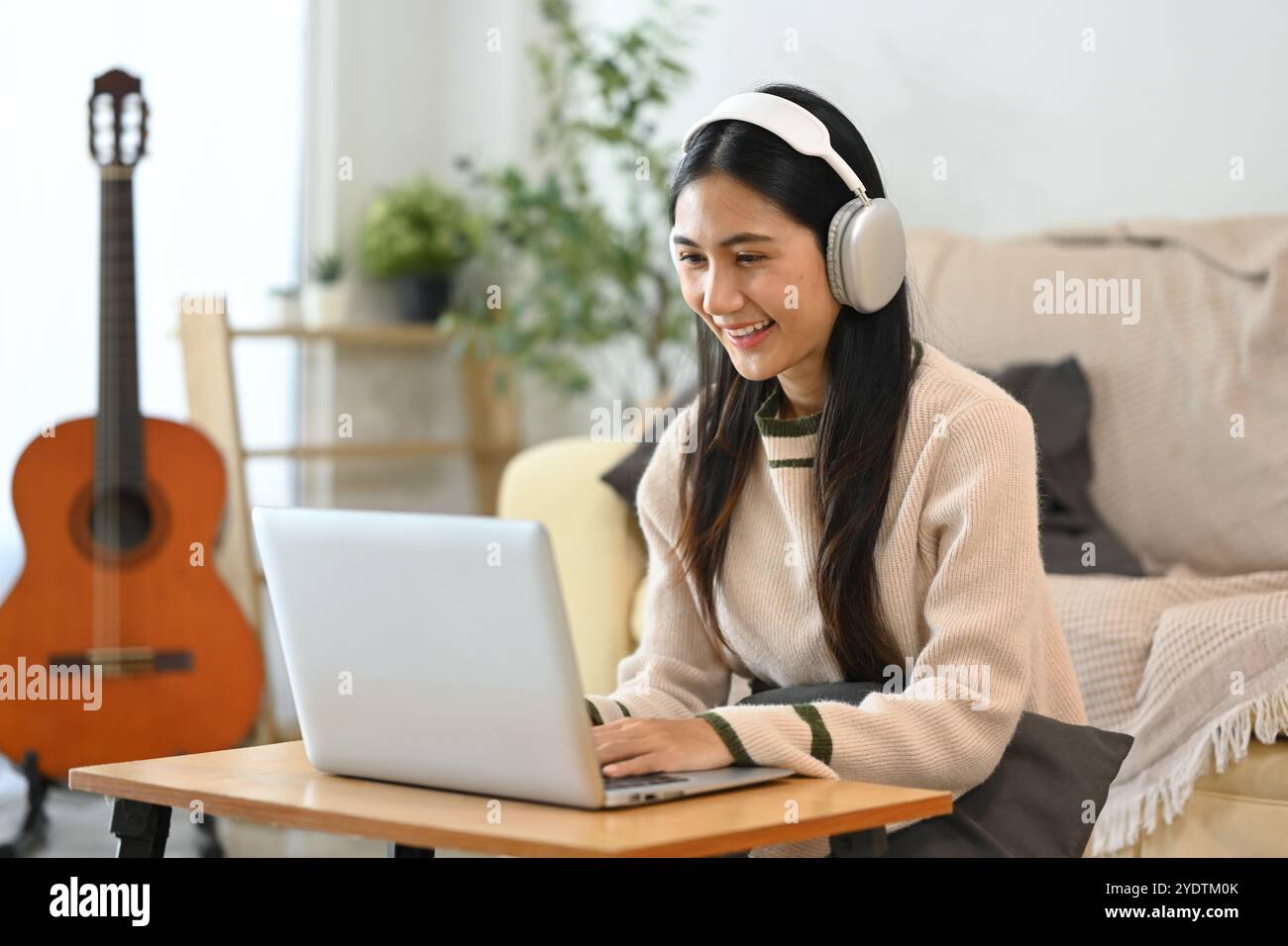 Attractive business woman happily using hi-res stock photography and ...