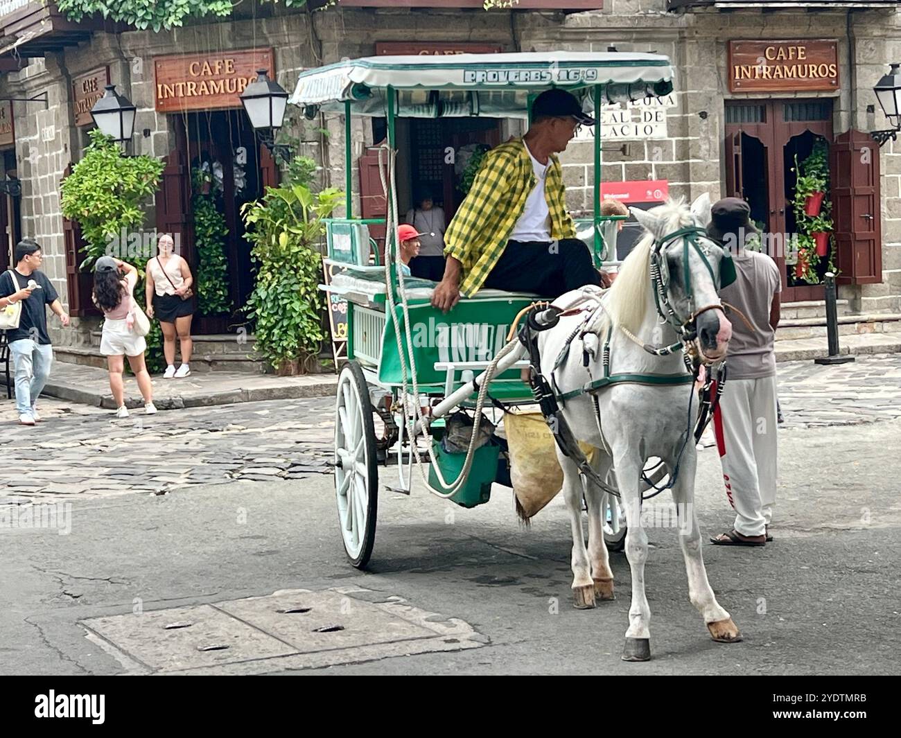 Manila, Philippines. 15th Oct, 2024. Traditional horse-drawn carriages ...