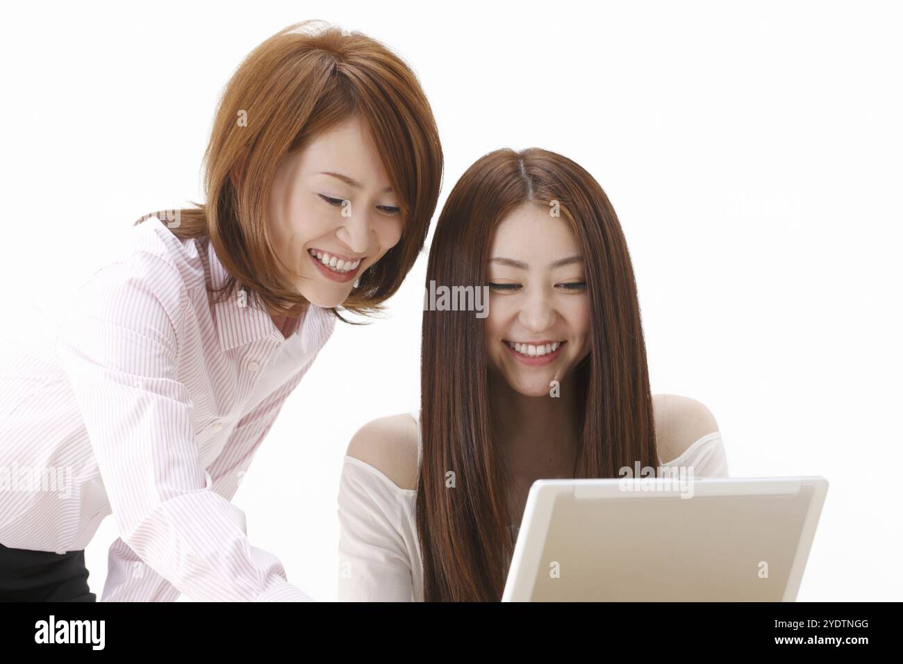 Senior and junior employees Stock Photo - Alamy