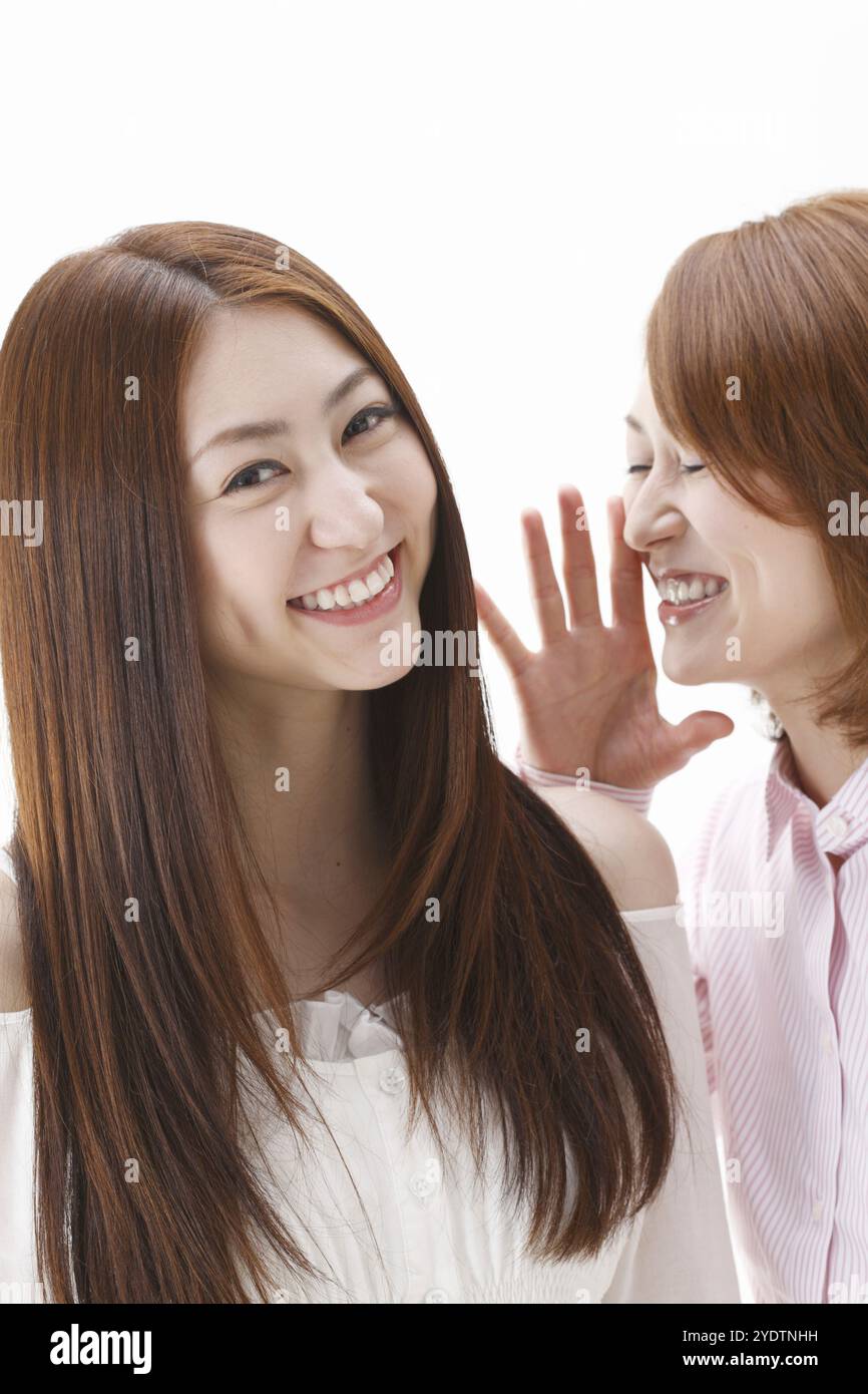 Talking by ear hi-res stock photography and images - Alamy