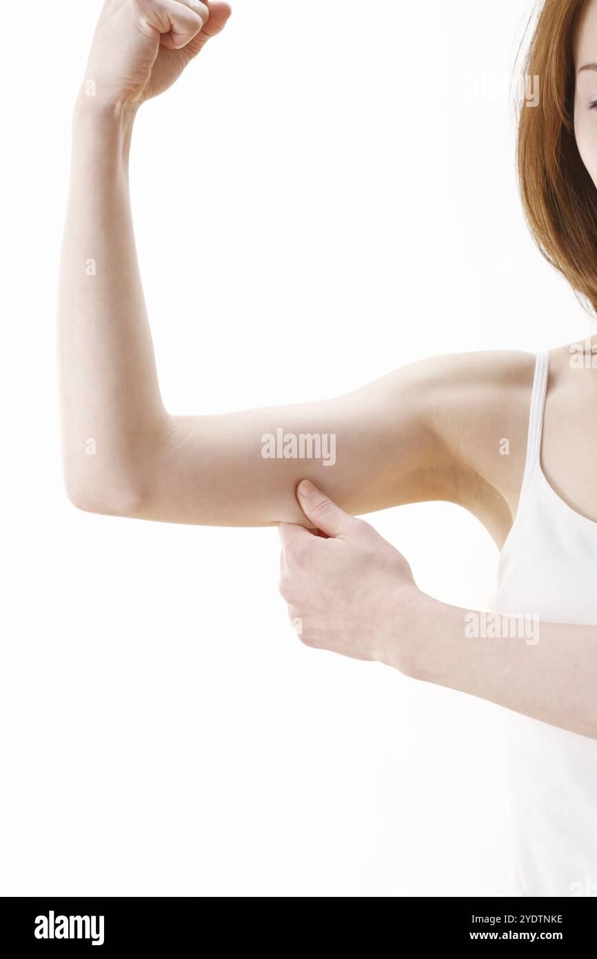 Pinching two arms Stock Photo - Alamy