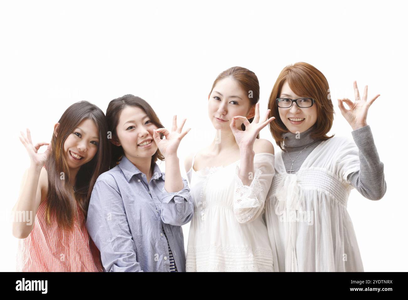 Four happy smiling women hi-res stock photography and images - Alamy