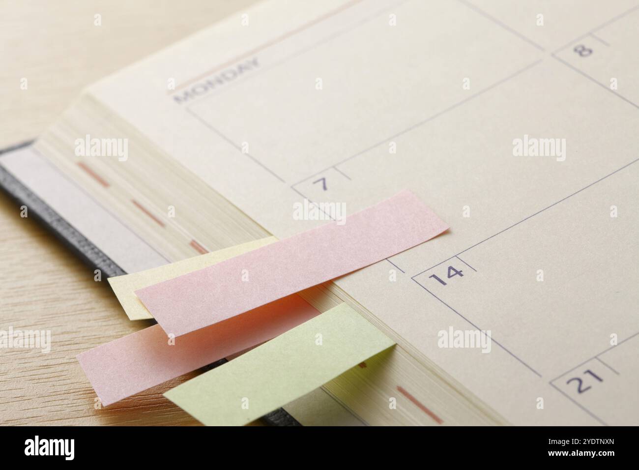 Schedule book with sticky notes Stock Photo - Alamy